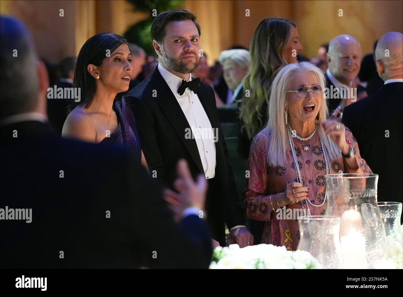 Vice President-elect JD Vance and Usha Vance stand with Miriam Adelson ...