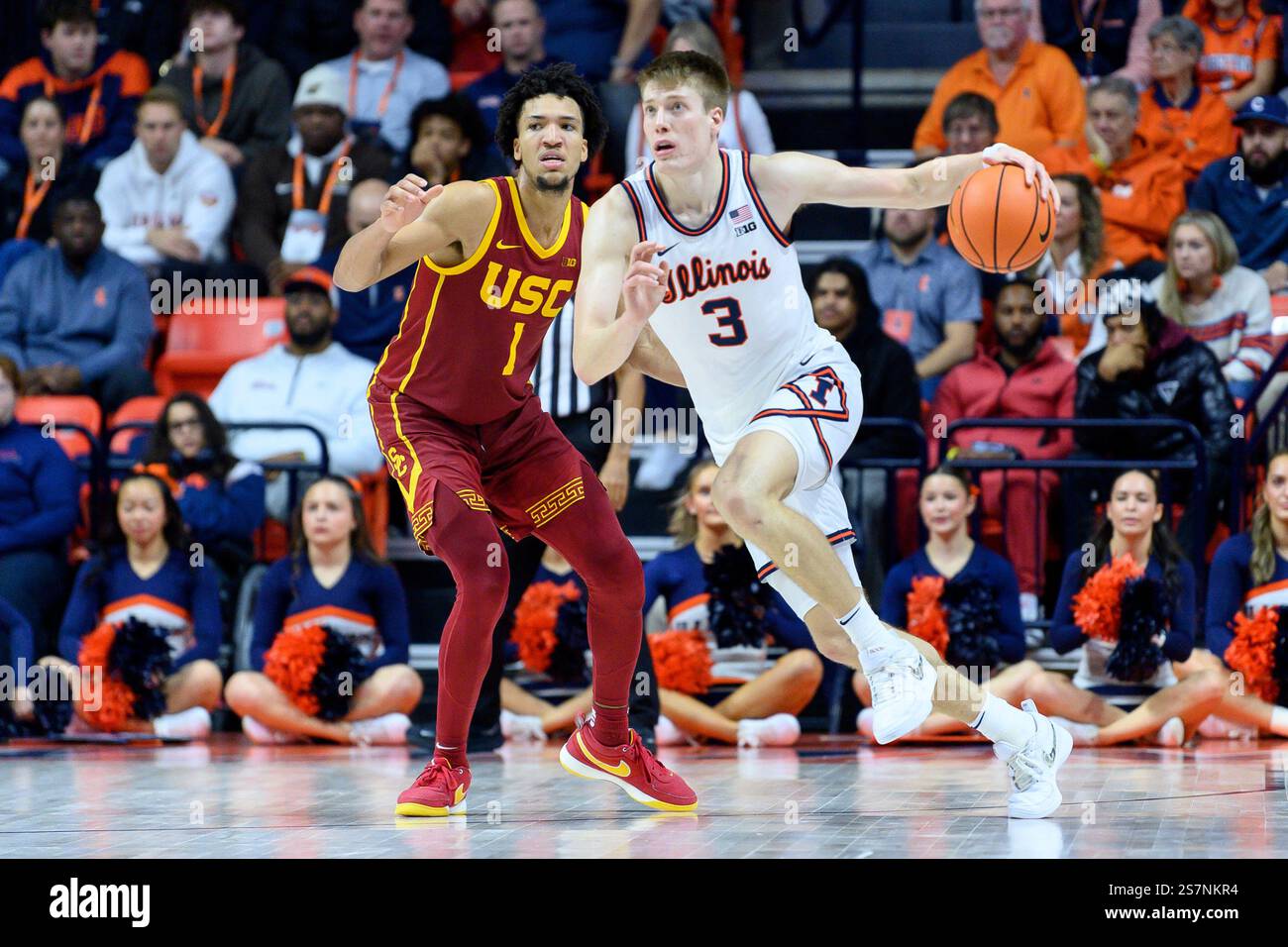 Illinois' Ben Humrichous drives past Southern California's Desmond ...