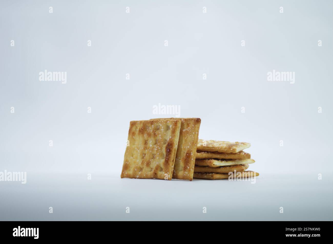 Stack of Salty Crackers Isolated on a Plain White Background Stock ...