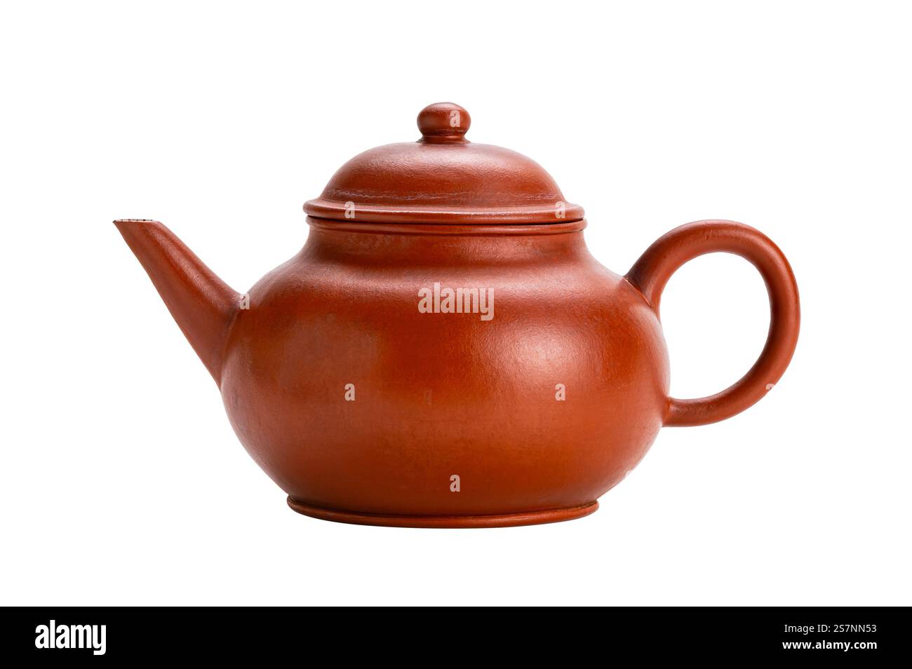 Closeup of the old clay red chinese teapot isolated on white background ...