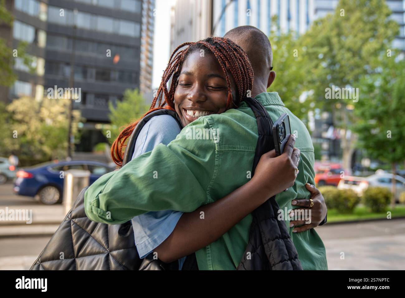 Long-awaited meeting of African American couple girl and guys with ...