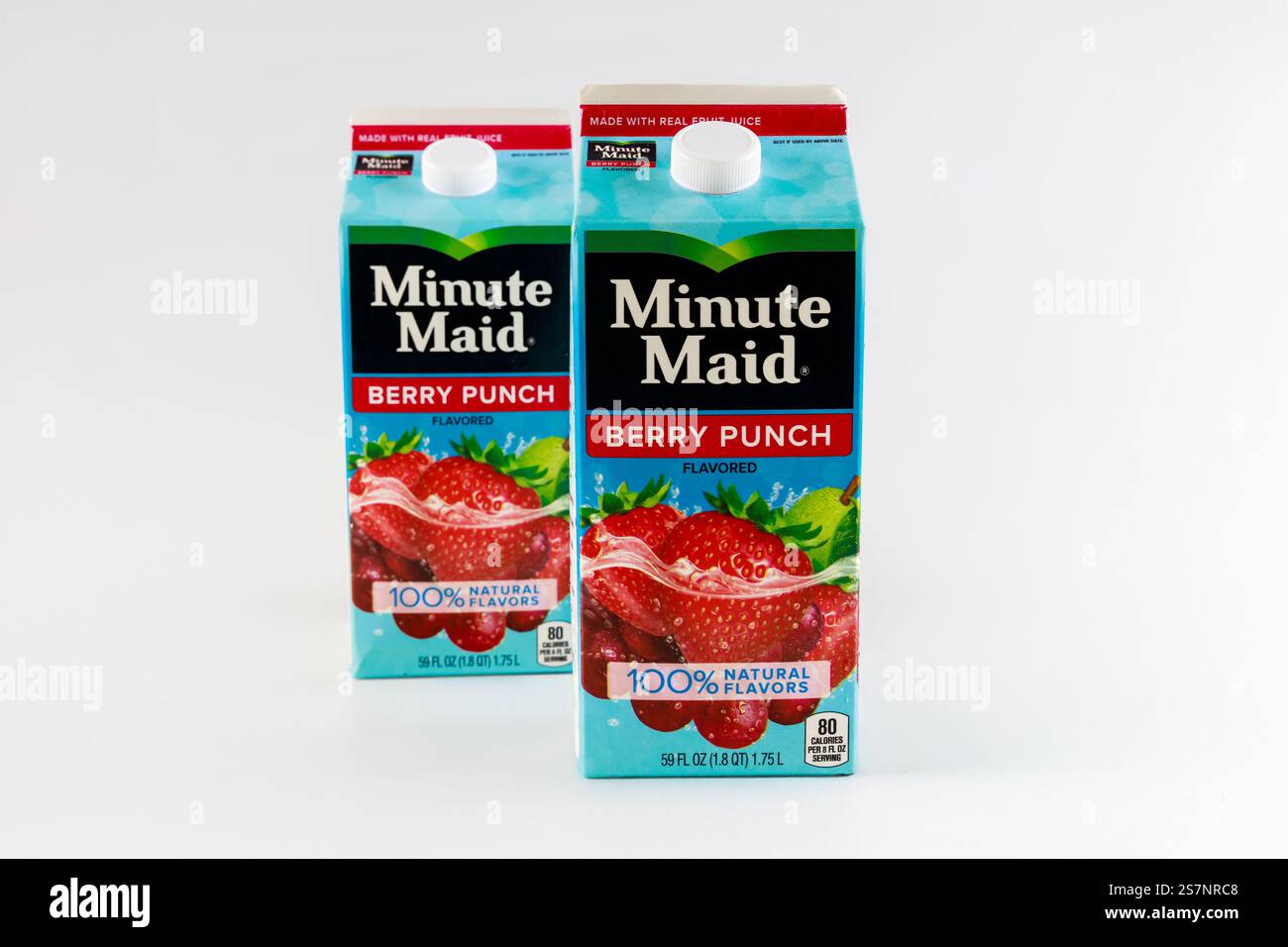 Berry punch beverage cartons displayed on white background in well-lit ...