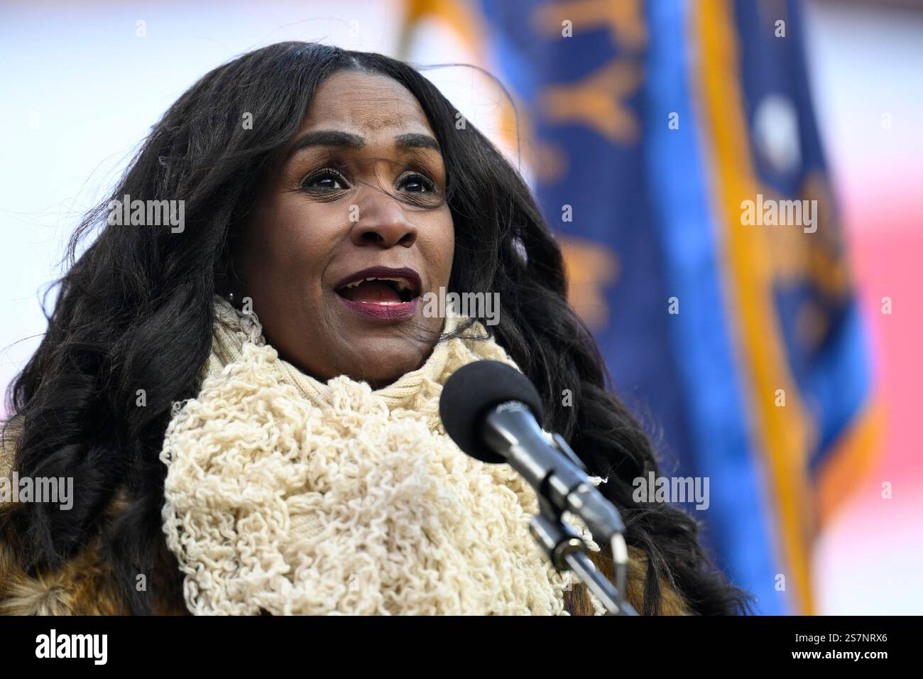 Lanell Lightfoot sings the national anthem before the start of an NFL ...