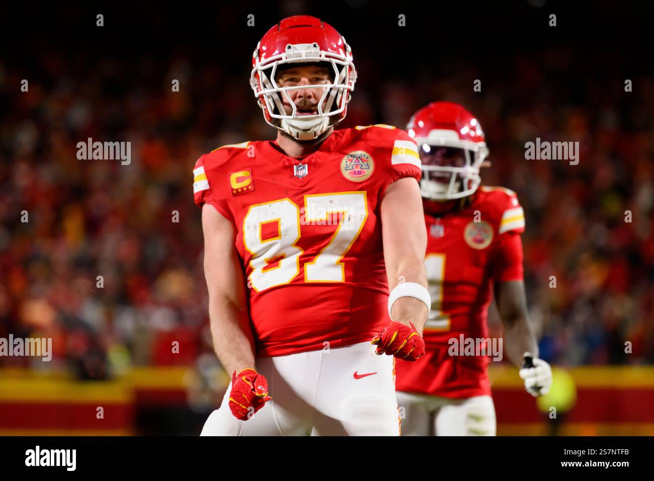 Kansas City Chiefs tight end Travis Kelce (87) is joined by Kansas City ...
