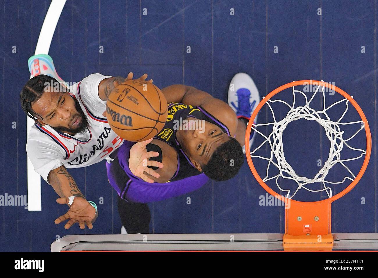 Los Angeles Clippers forward Derrick Jones Jr., left, shoots as Los ...