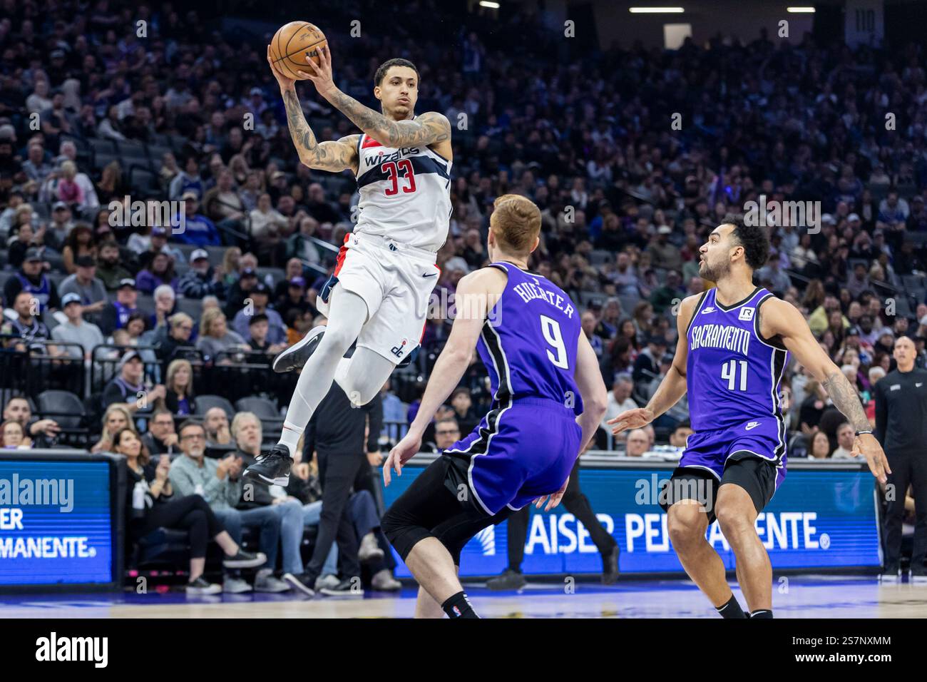 Washington Wizards forward Kyle Kuzma (33) looks to pass the ball over ...