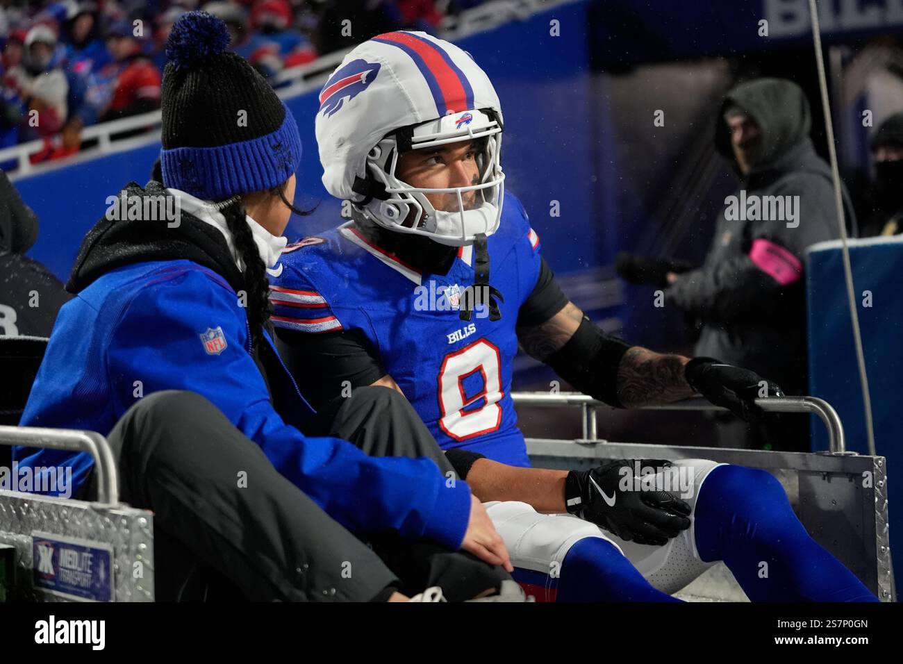 Buffalo Bills safety Taylor Rapp (9) is taken off the field after an ...