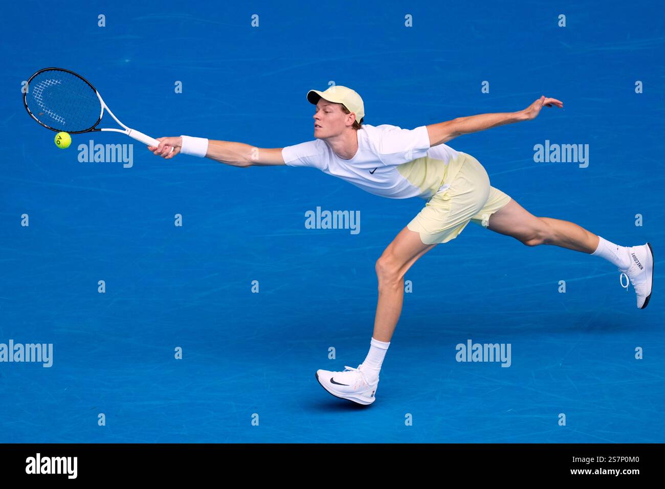 Jannik Sinner of Italy plays a forehand return to Holger Rune of ...