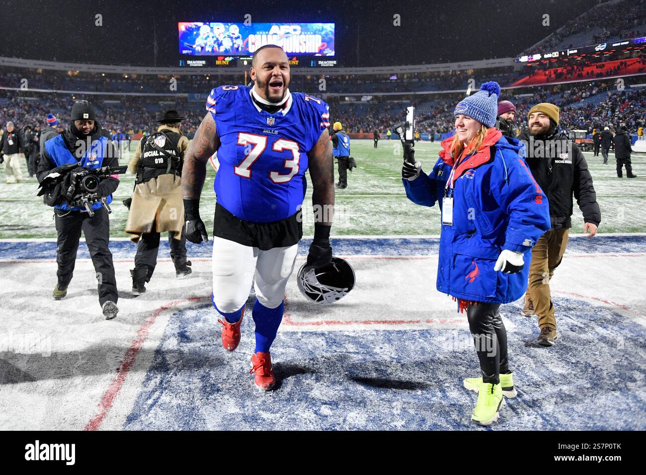 Buffalo Bills offensive tackle Dion Dawkins (73) walks off the field after playing against the ...