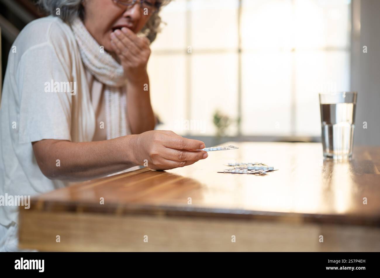 Senior old woman coughing standing hi-res stock photography and images ...