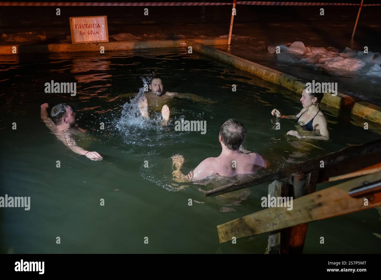 St. Petersburg, Russia. 18th Jan, 2025. Russian Orthodox believers swim ...