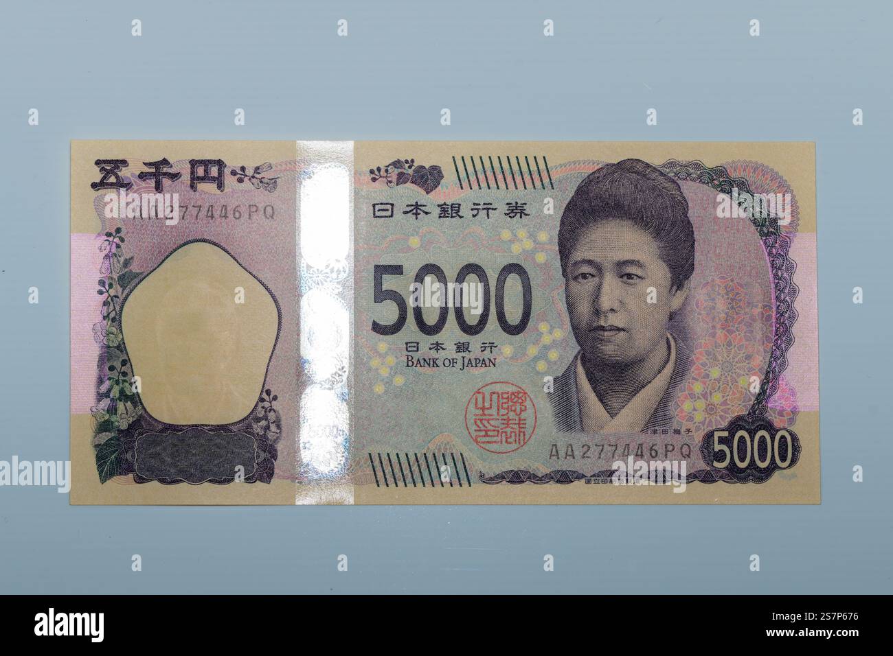 Taipei, Taiwan-January 20, 2025 Japanese 5000 yen banknote on one side ...