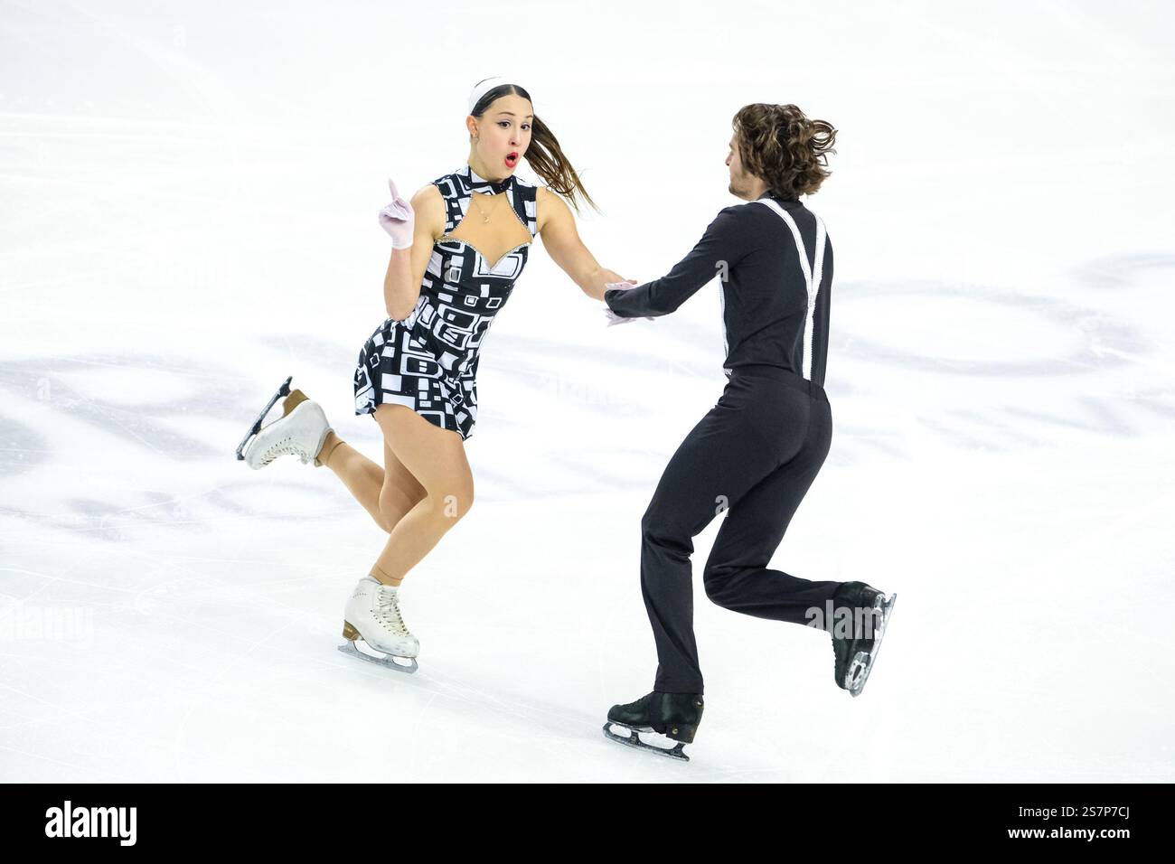 Emese Csiszer (L) and Mark Shapiro (R) (HUN) perform during the FISU ...