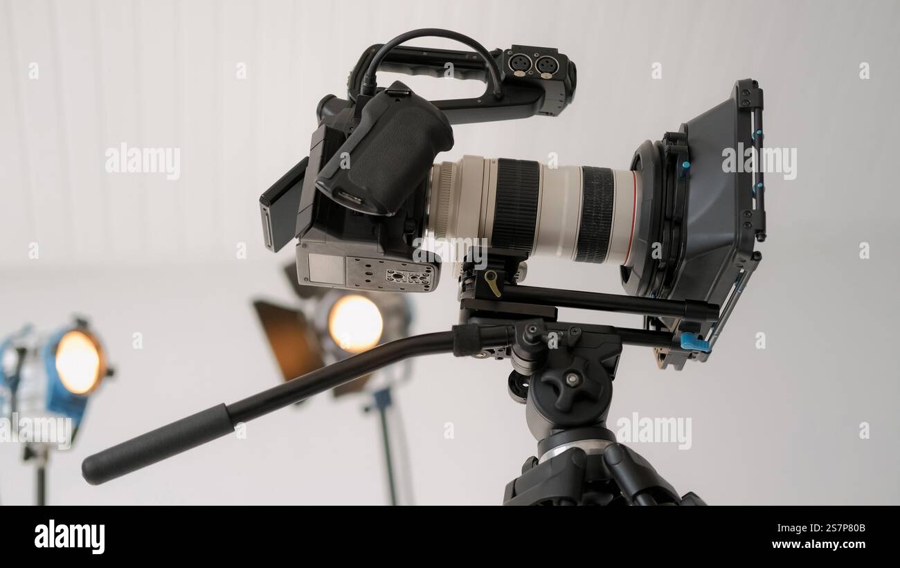 Camera tripod. Video studio. Professional filming equipment indoor with ...