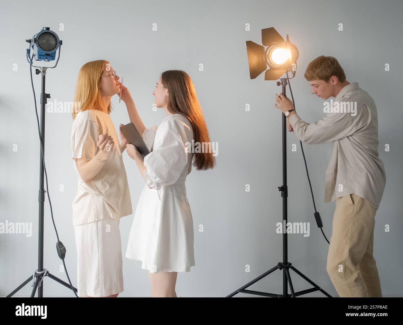 Preparation model. Work stylist photo. Brunette corrects hair blonde ...