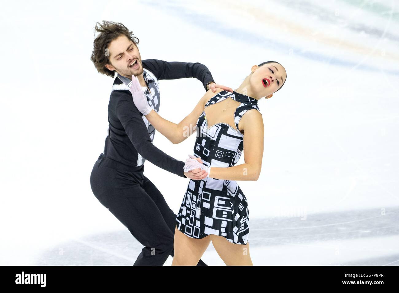 Mark Shapiro (L) and Emese Csiszer (R) (HUN) perform during the FISU ...