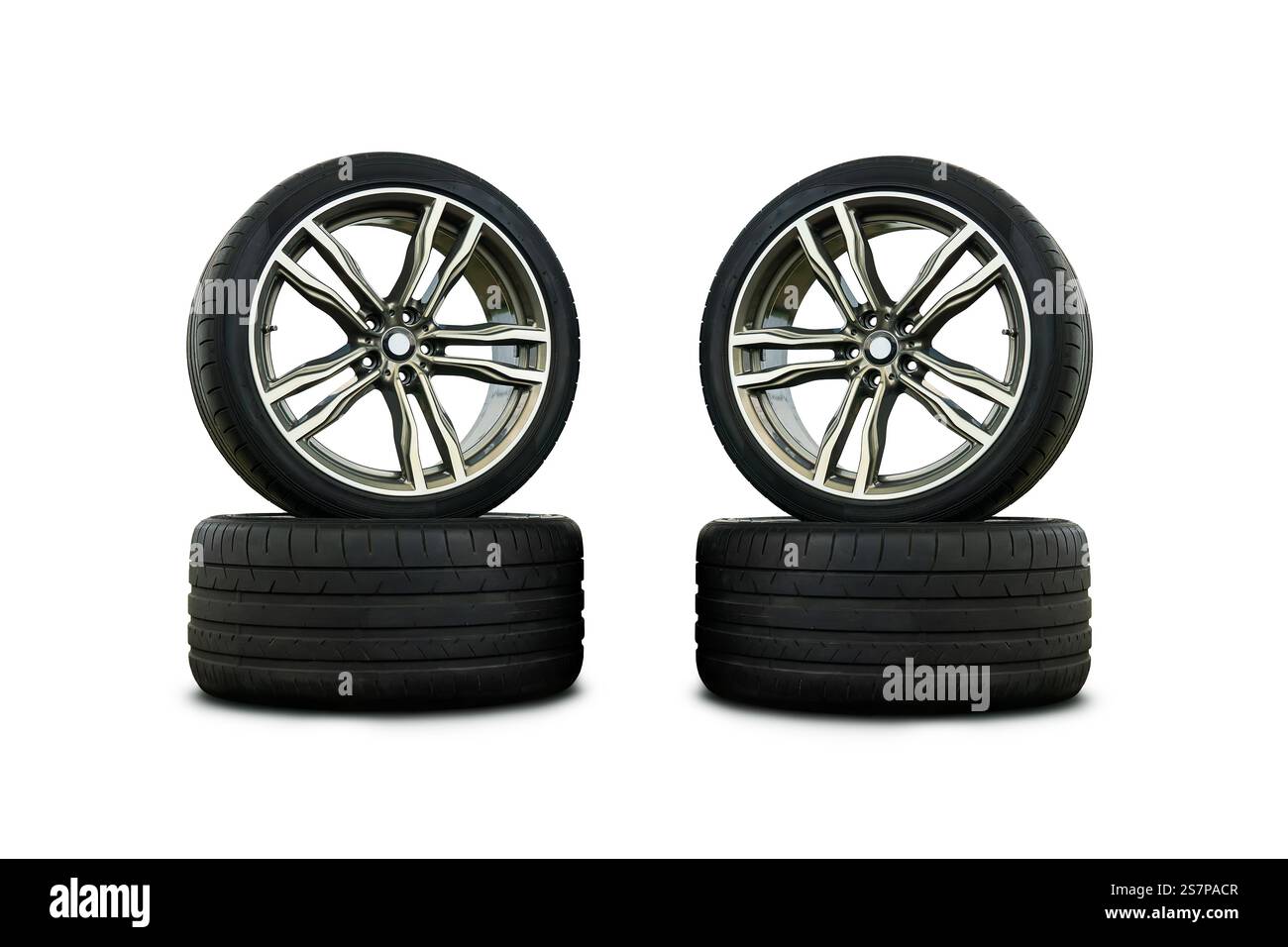 Four new good-looking tires isolated on the white background. A set of ...