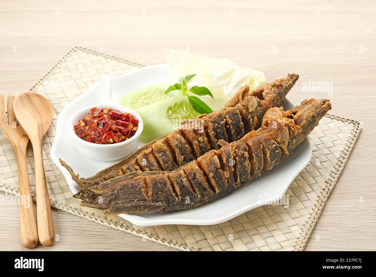 Lele Goreng or Fried Catfish, Indonesian traditional food. Served with ...