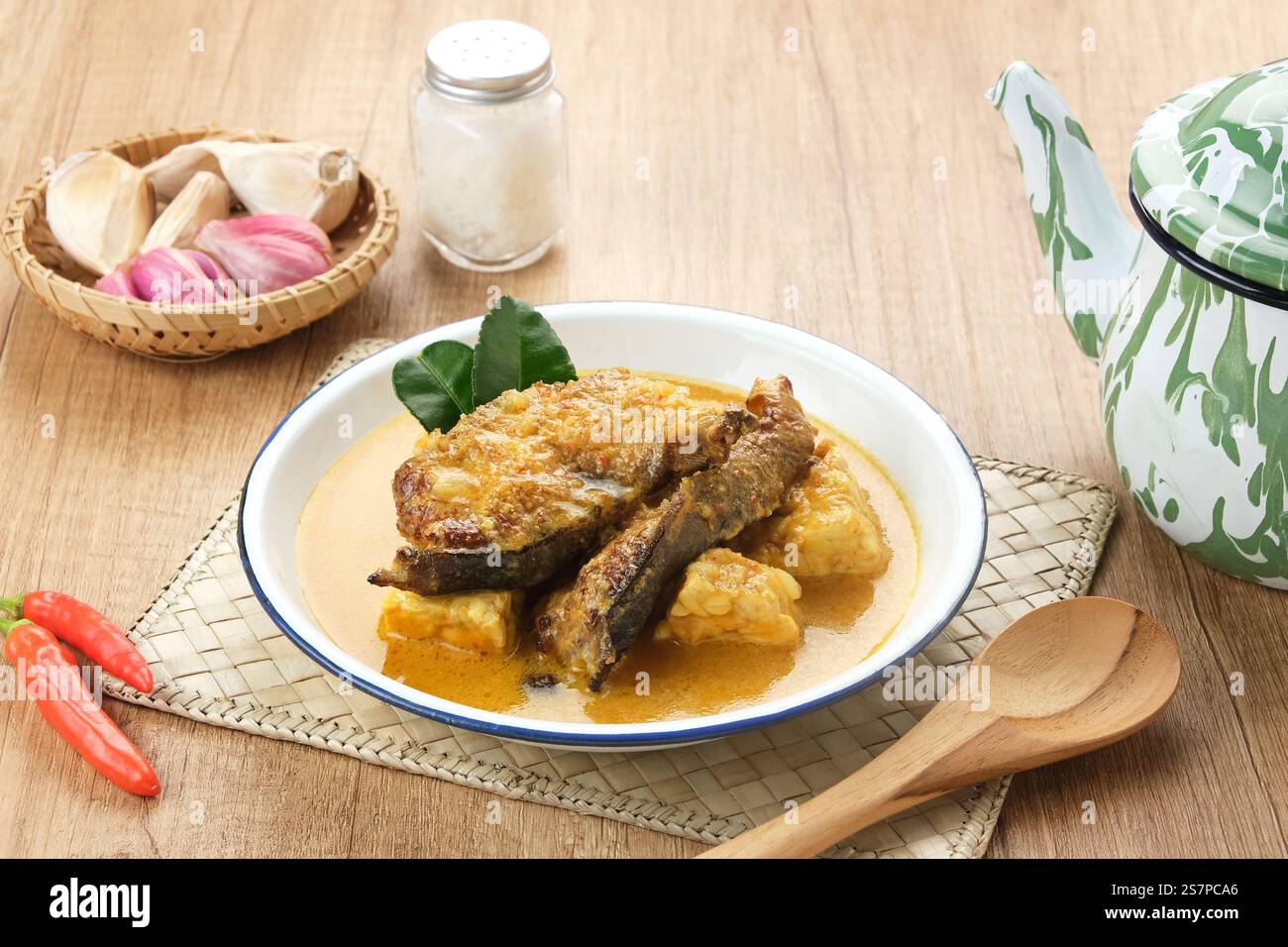 Mangut, made from smoked stingray fish cooked with spices and coconut ...