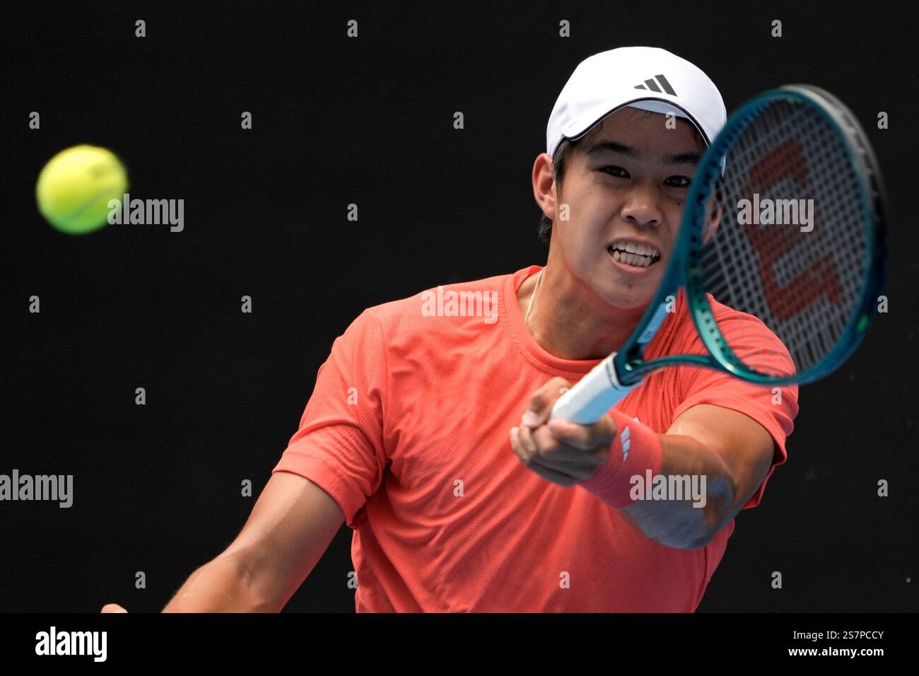 Learner Tien of the U.S. plays a forehand return to Lorenzo Sonego of ...