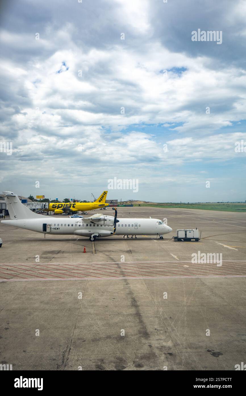 Bustling activity in the Port-au-Prince airport, with a Spirit Airline ...