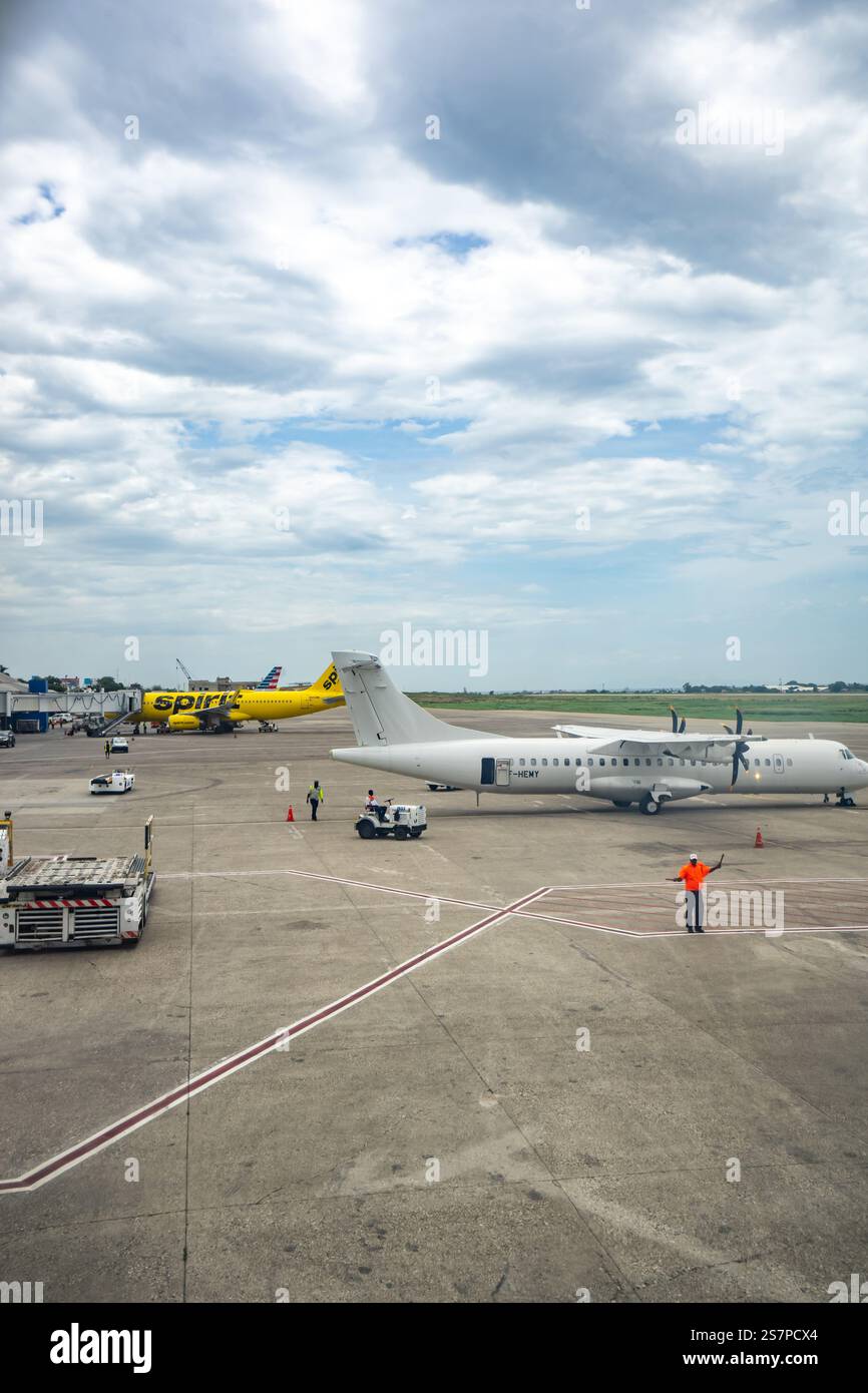 Bustling activity in the Port-au-Prince airport, with a Spirit Airline ...