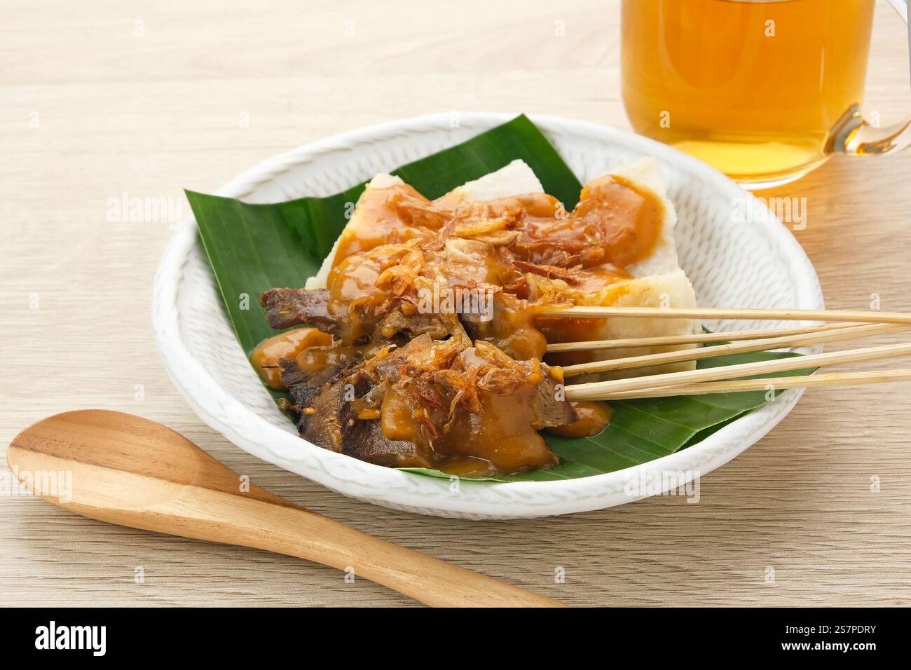 Sate Padang, beef satay from West Sumatra, Indonesia, served with spicy ...