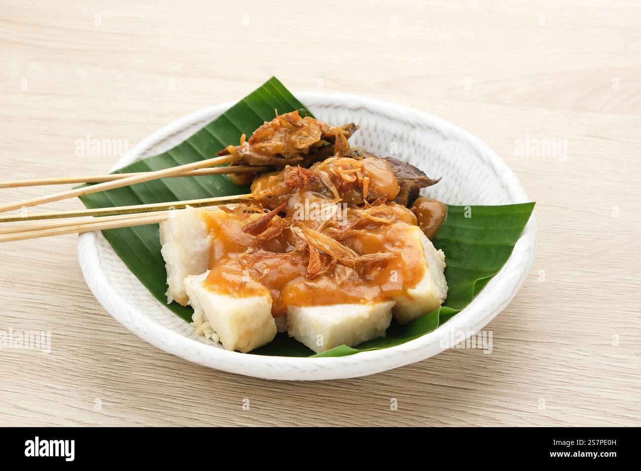 Sate Padang, beef satay from West Sumatra, Indonesia, served with spicy ...