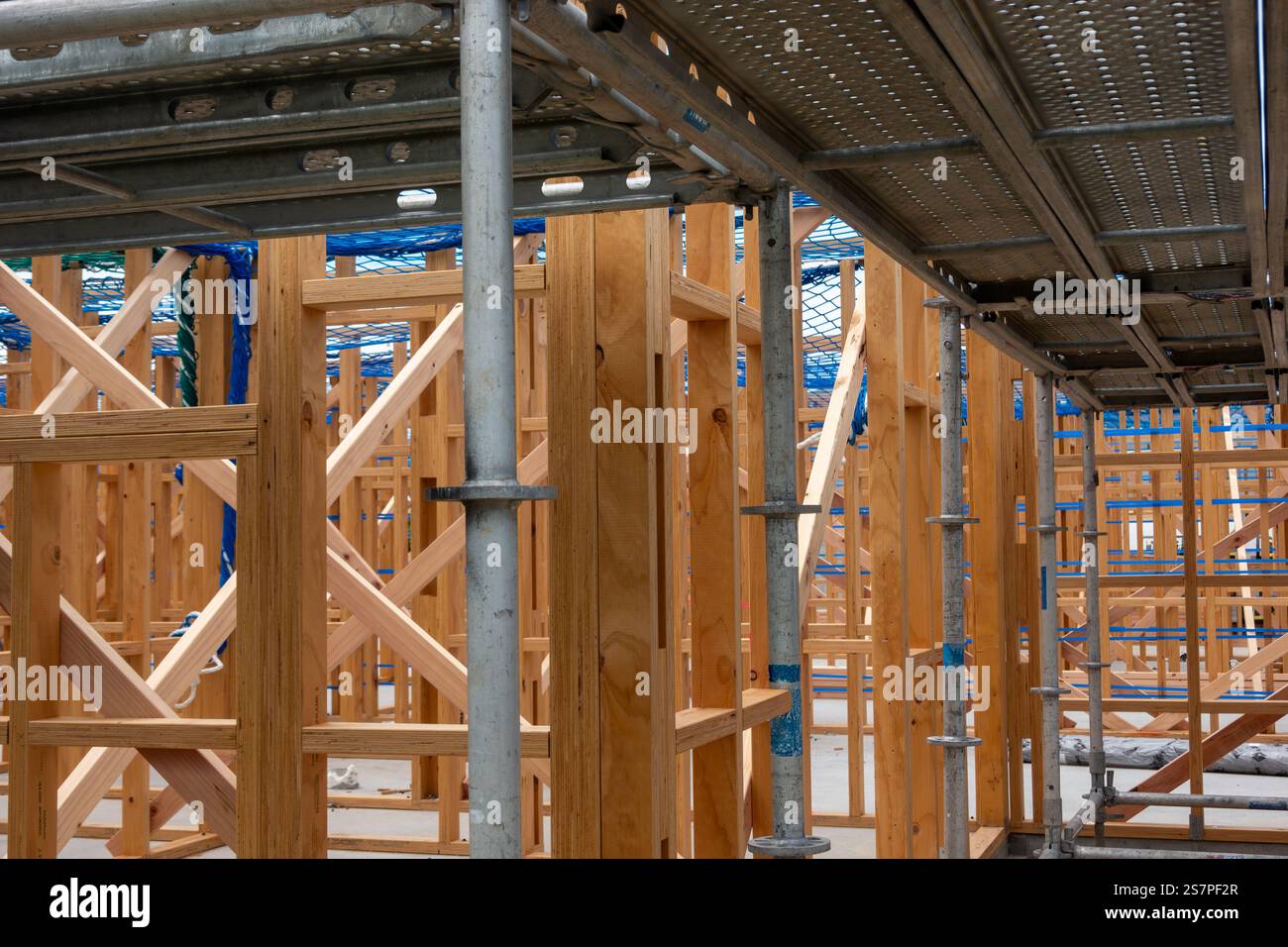 Closeup construction timber framing pattern and scaffolding for new ...