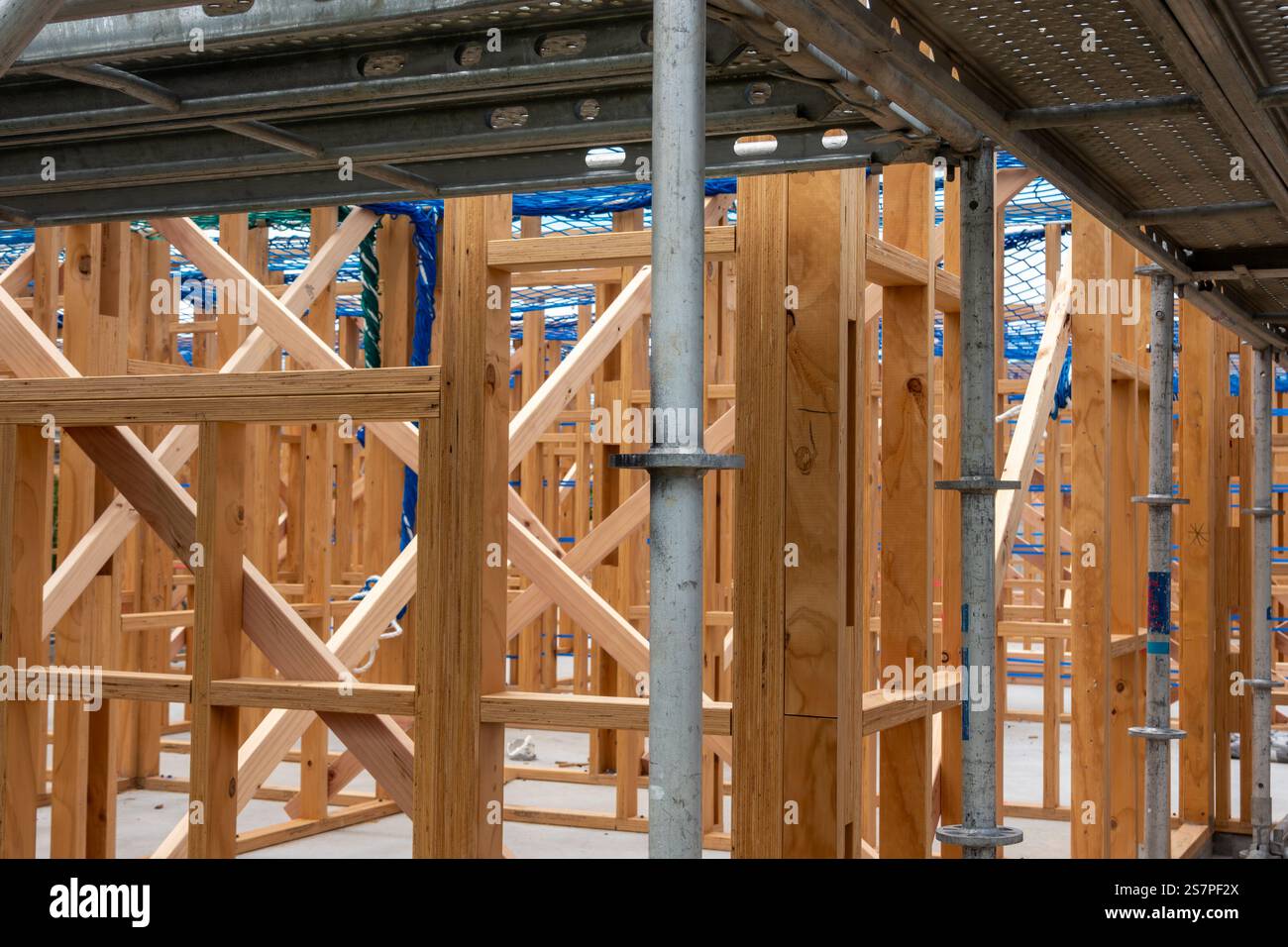 Closeup construction timber framing pattern and scaffolding for new ...