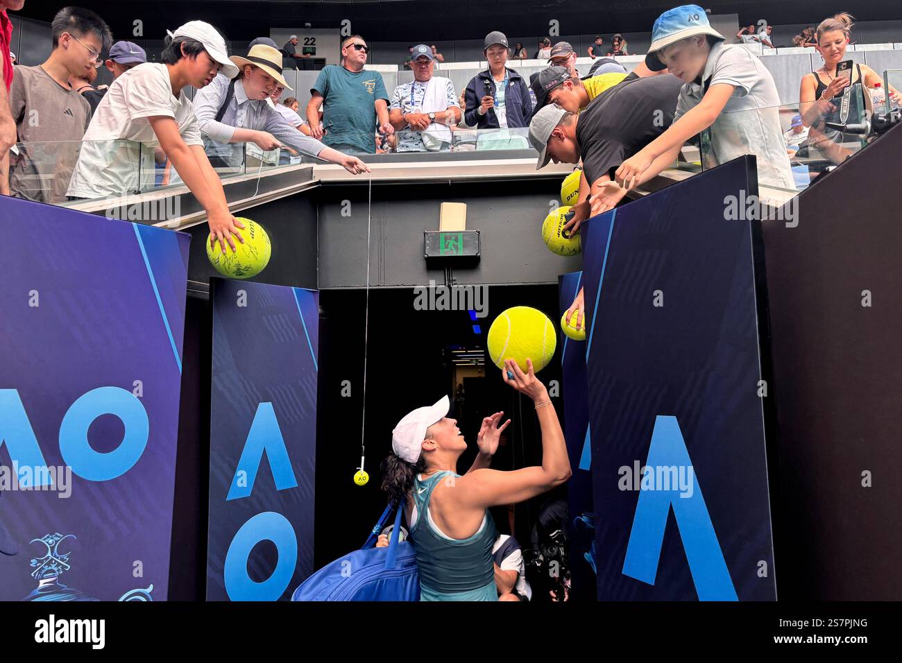 Madison Keys of the U.S. signs autographs following her their fourth ...