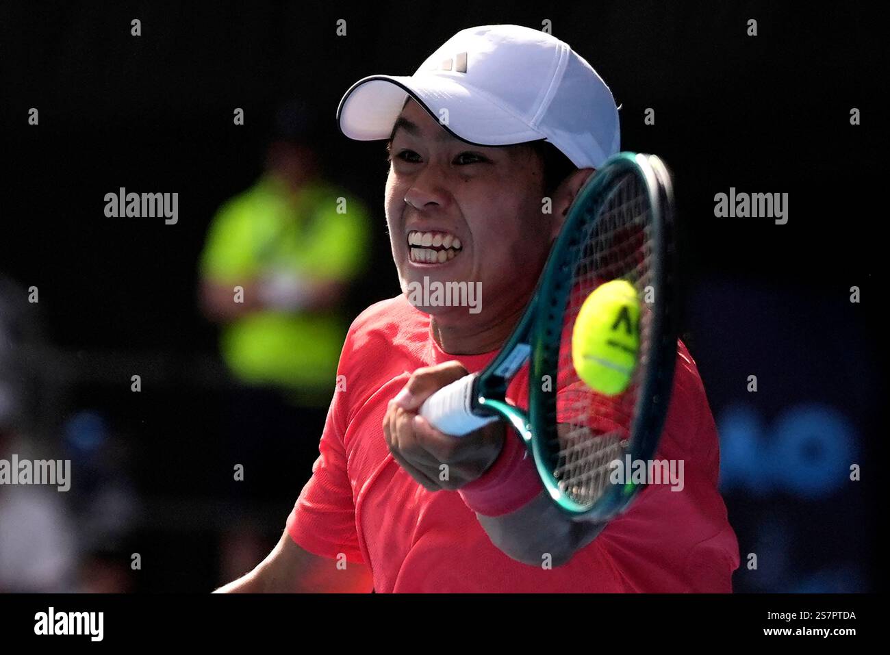 Learner Tien of the U.S. plays a forehand return to Lorenzo Sonego of ...