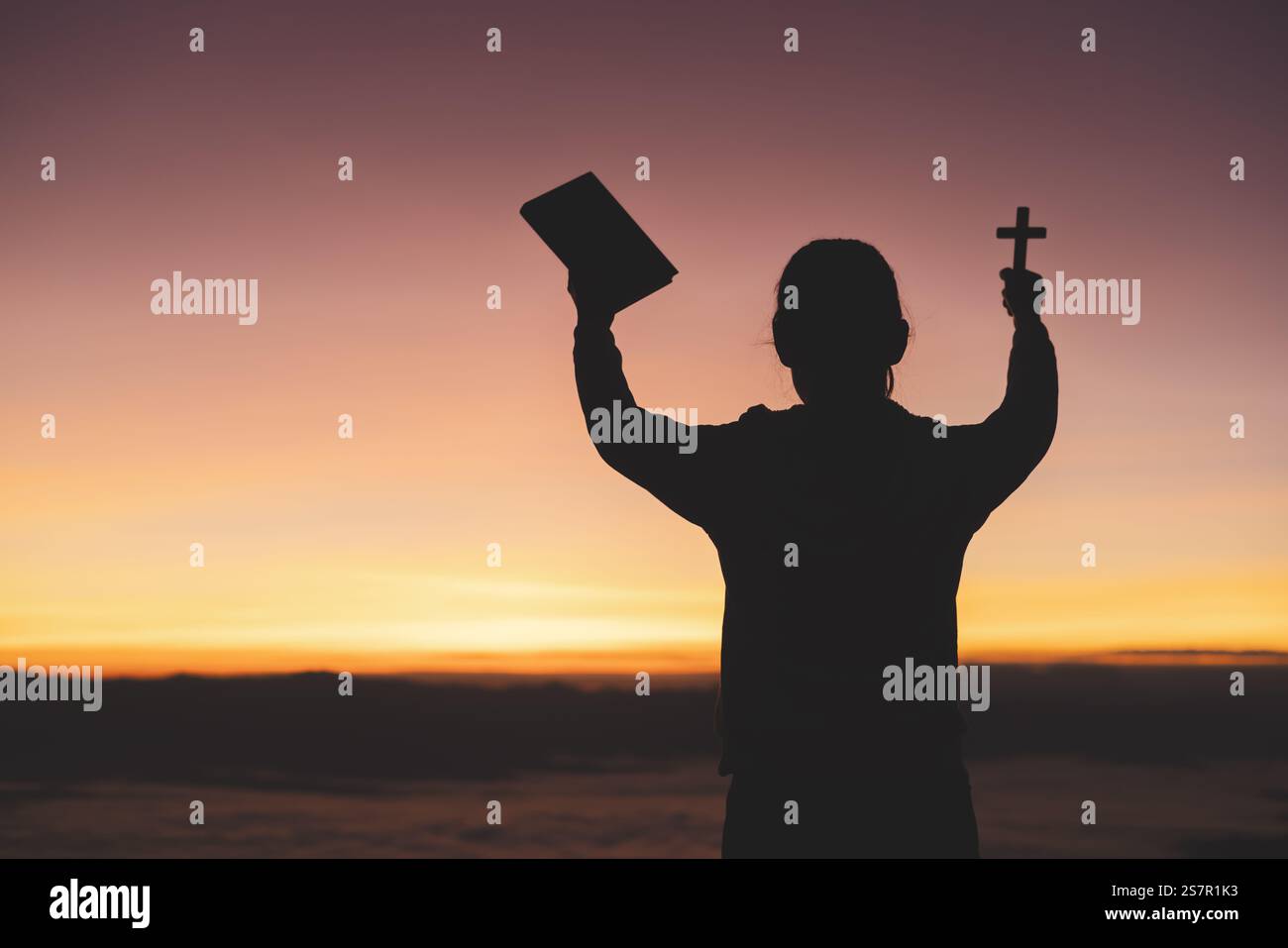 silhouette of a man Praying hands with faith in religion and belief in ...