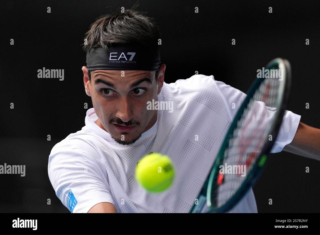Lorenzo Sonego of Italy plays a backhand return to Learner Tien of the ...