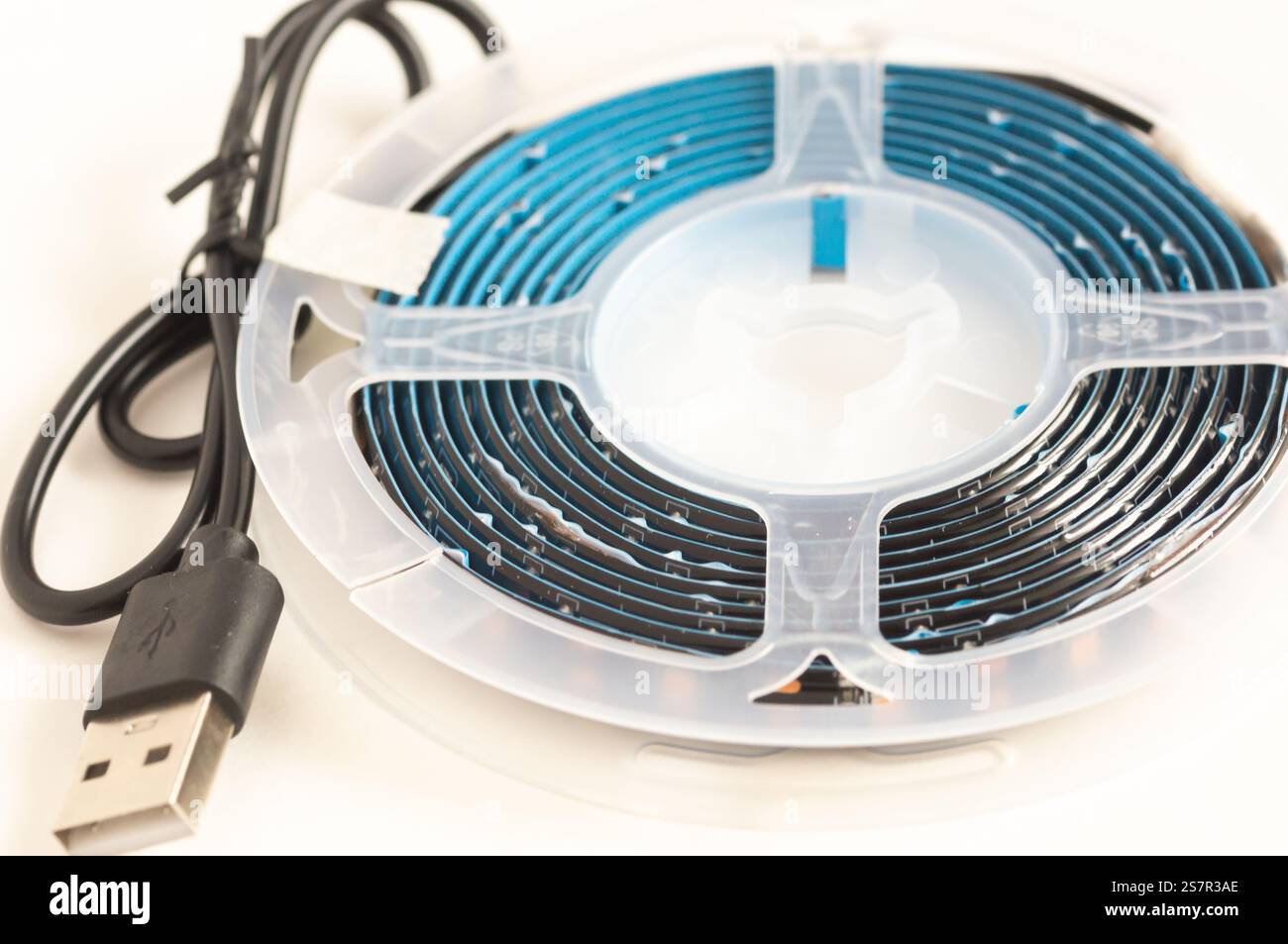 LED strip in coil on white background Stock Photo - Alamy