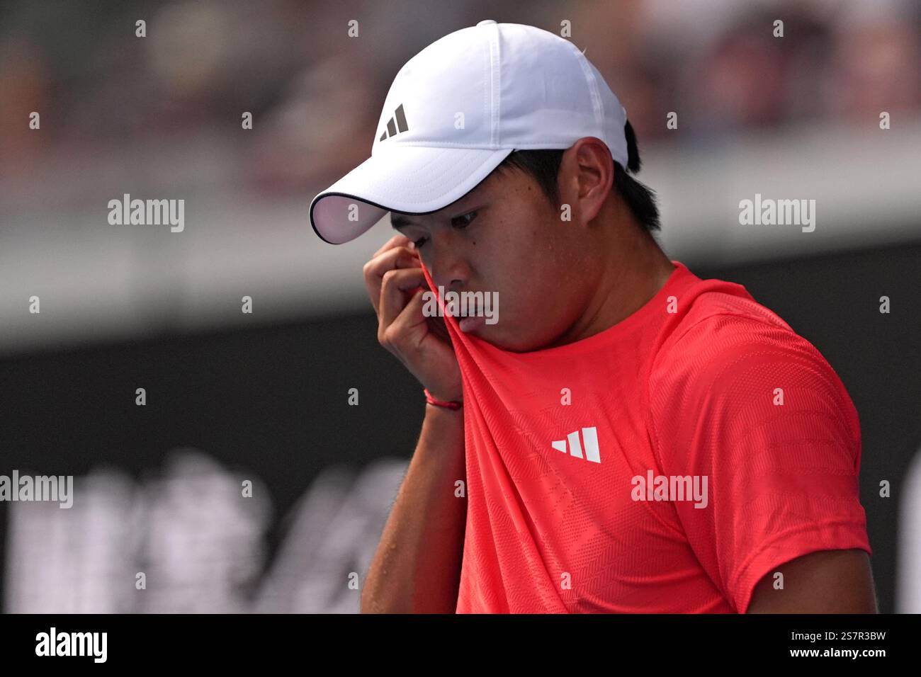 Learner Tien of the U.S. reacts during his fourth round win over ...