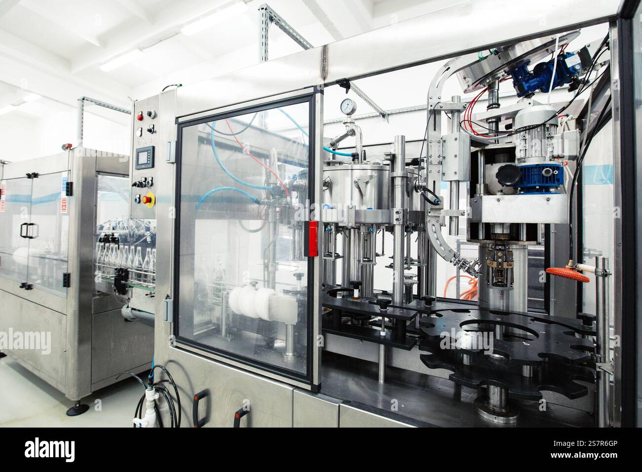 Advanced manufacturing equipment operates in a clean room environment ...