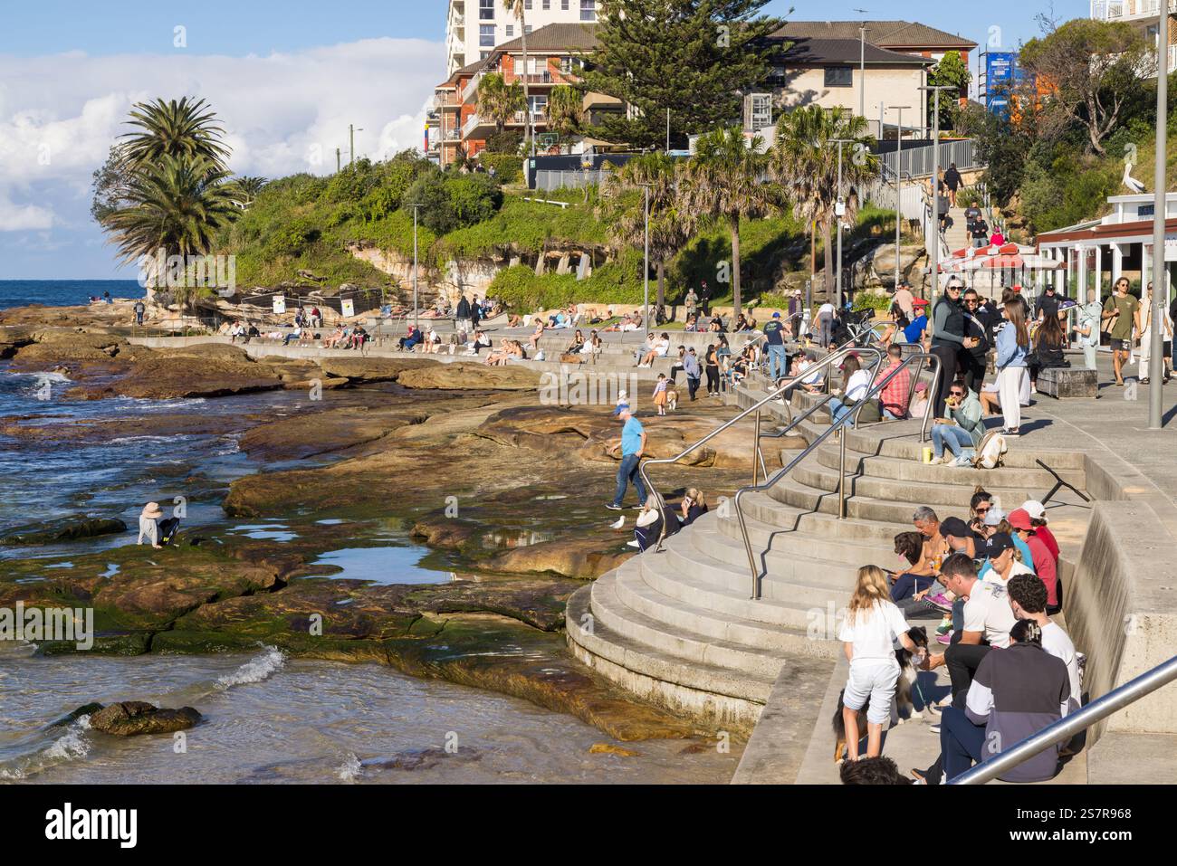 People on the waterfront esplanade at Cronulla Beach, Sydney, Australia ...