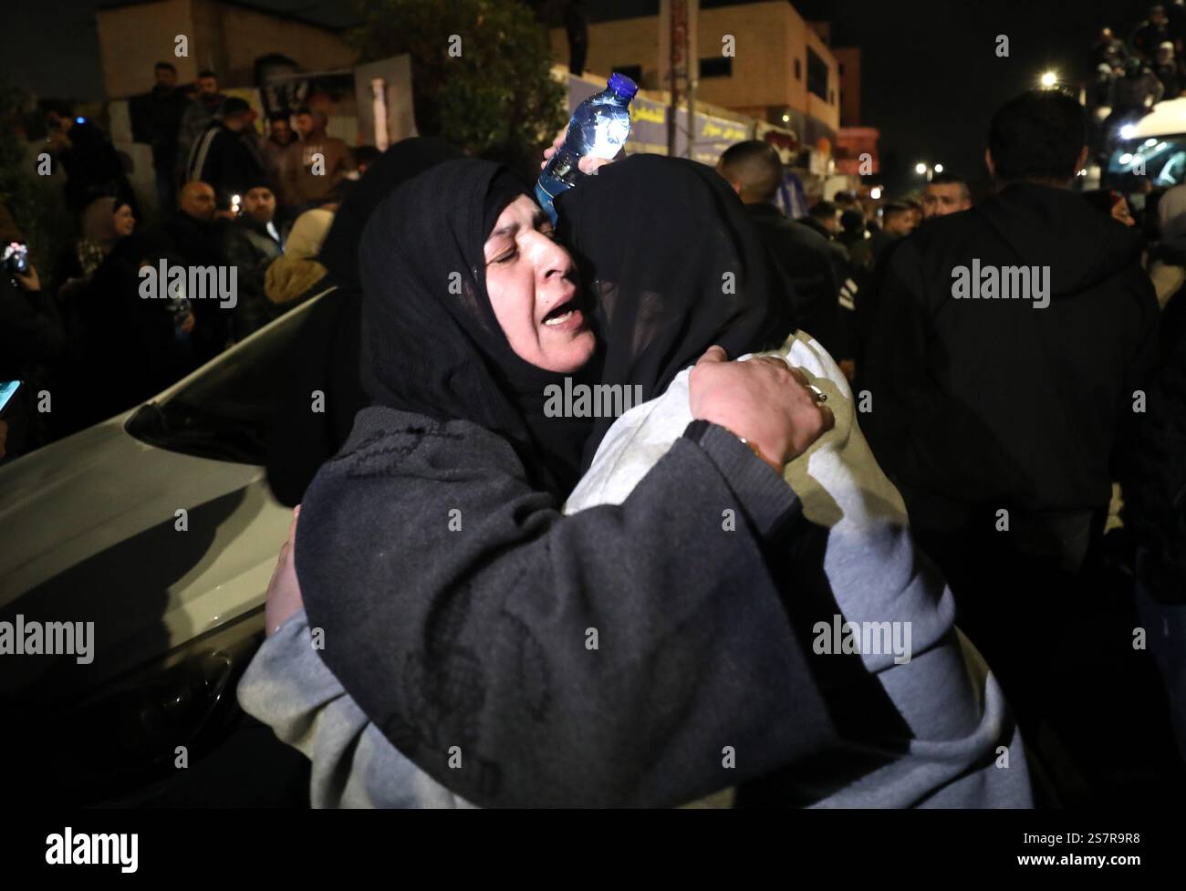 20 January 2025, ---, Beitunia: A Palestinian released prisoner hugs ...