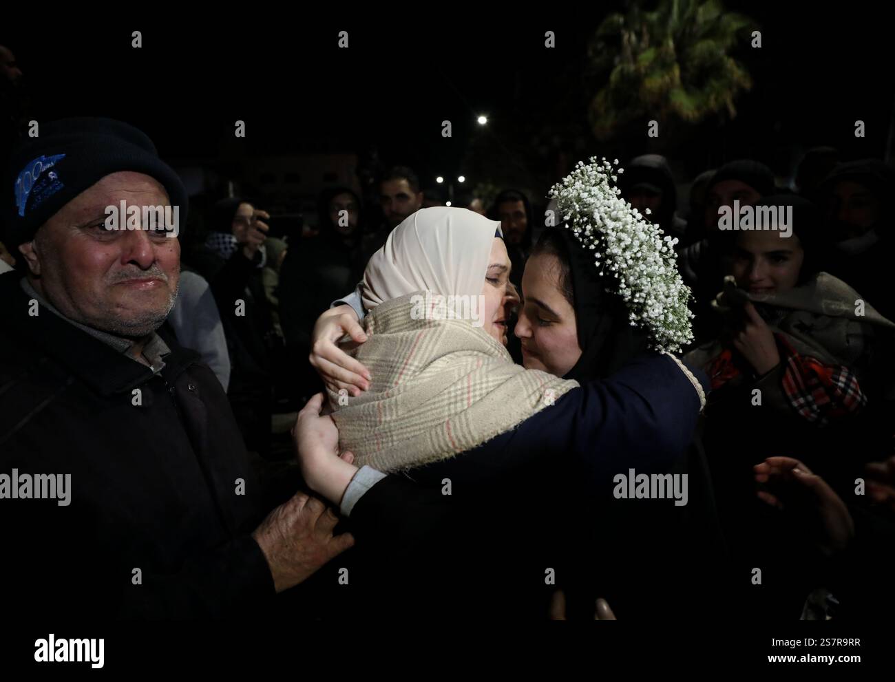 20 January 2025, ---, Beitunia: A Palestinian released prisoner hugs ...