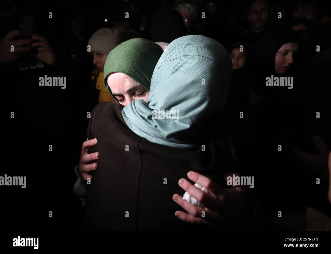 20 January 2025, ---, Beitunia: A Palestinian released prisoner hugs ...