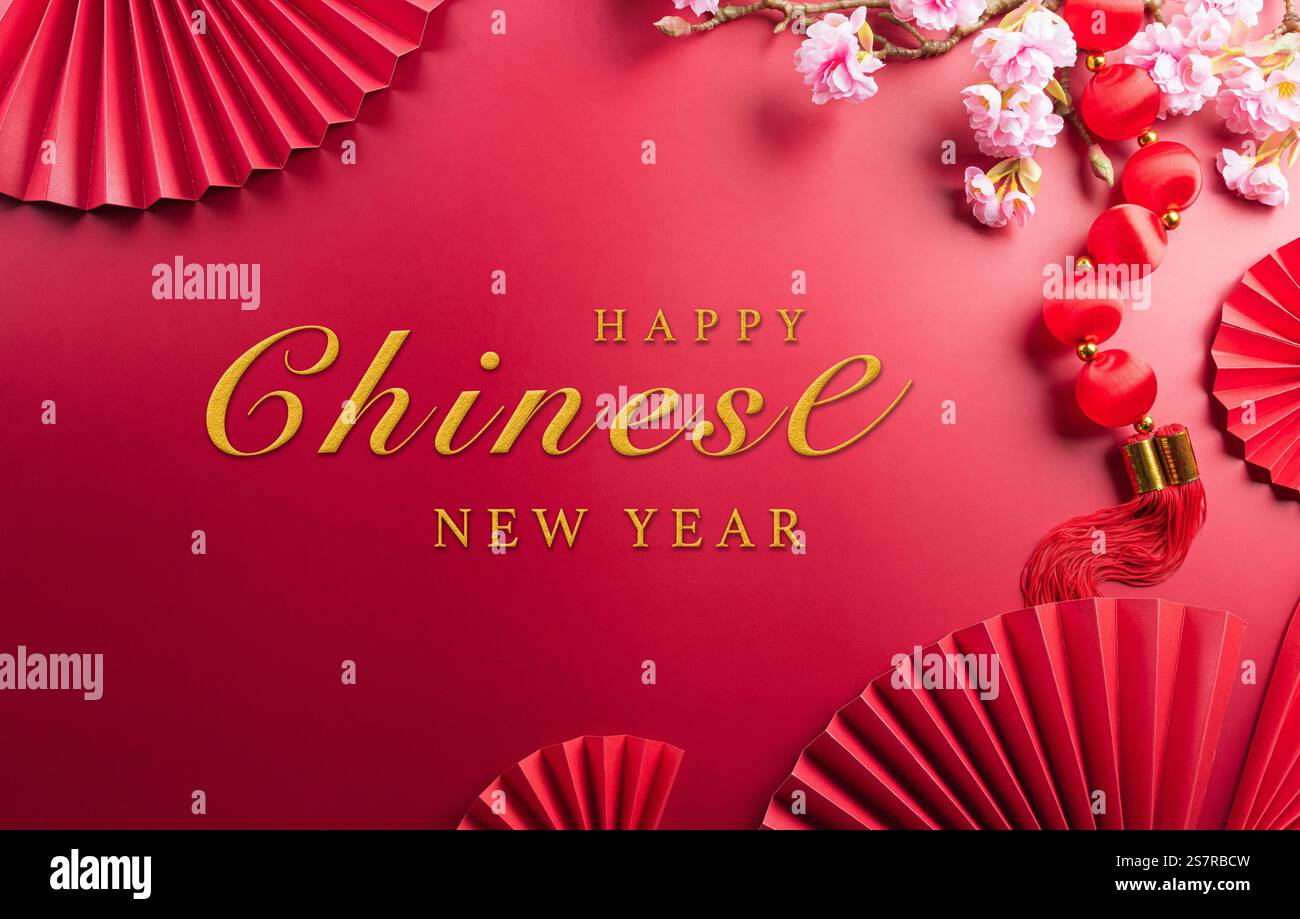 Chinese new year decorations made from plum blossom and gold ingots or ...