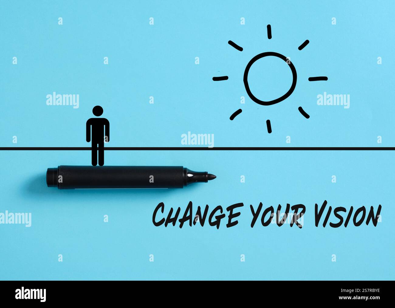 Marker pen dividing a person from the sun, symbolizing a change in ...