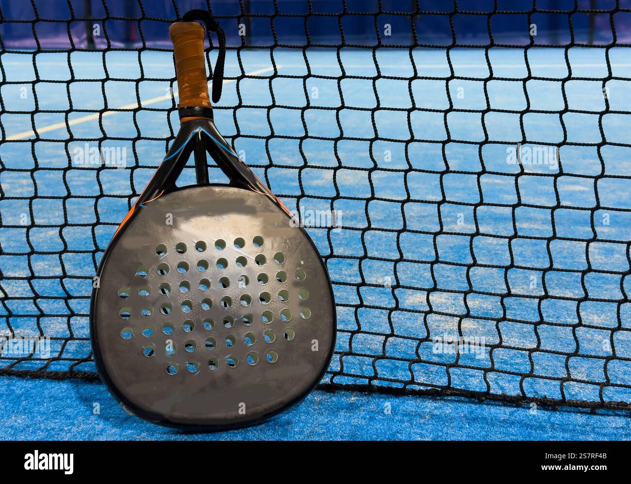 Padel tennis racket. Background with copy space. Sport court and balls ...