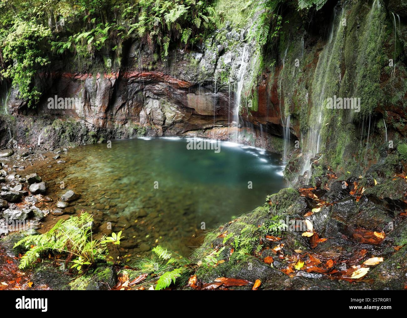 The 25 Fontes waterfall and natural pool. Hiking point, located in ...