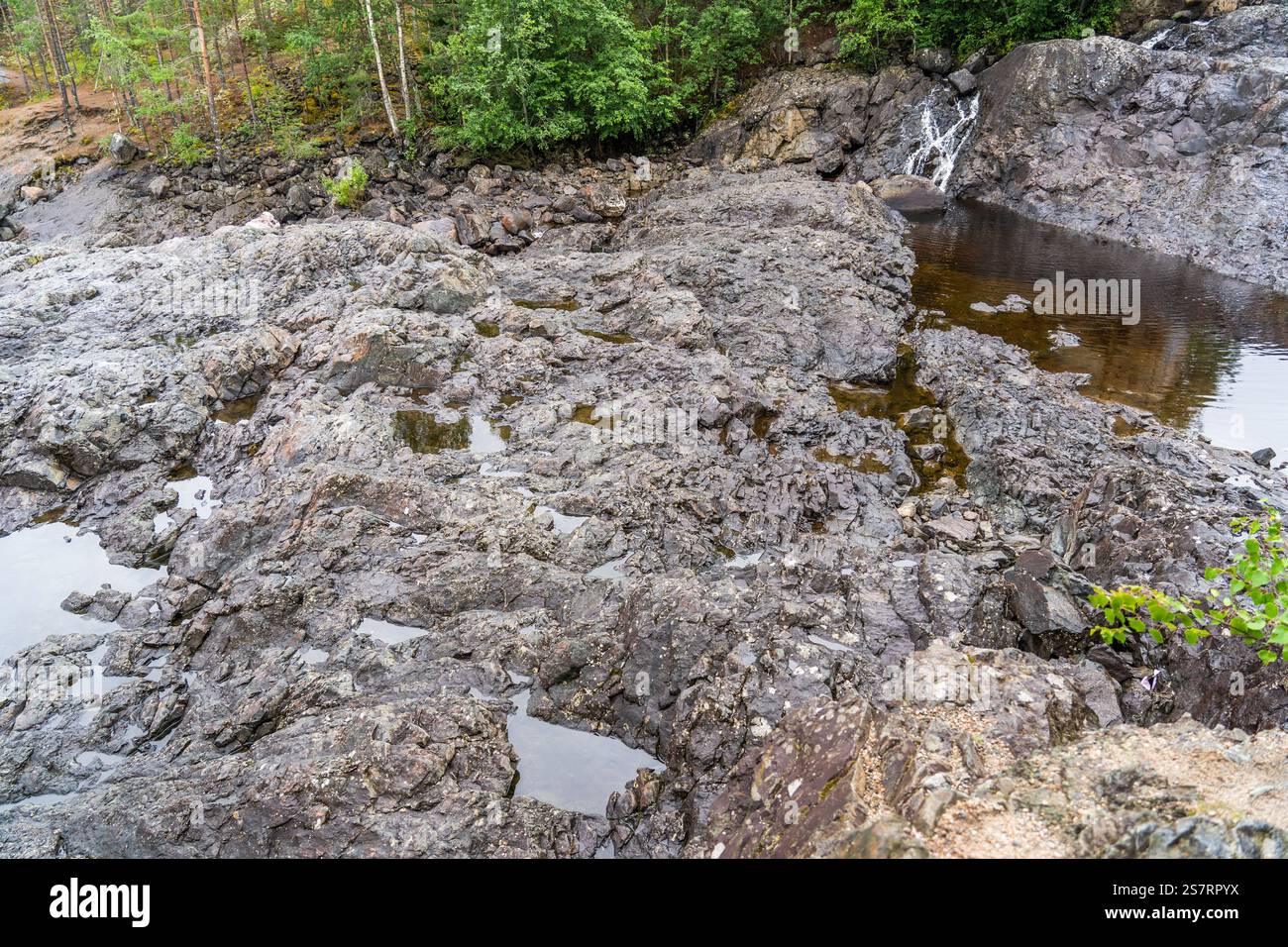 Rocks of extinct ancient paleo-volcano Girvas in Karelia, Russia Stock ...