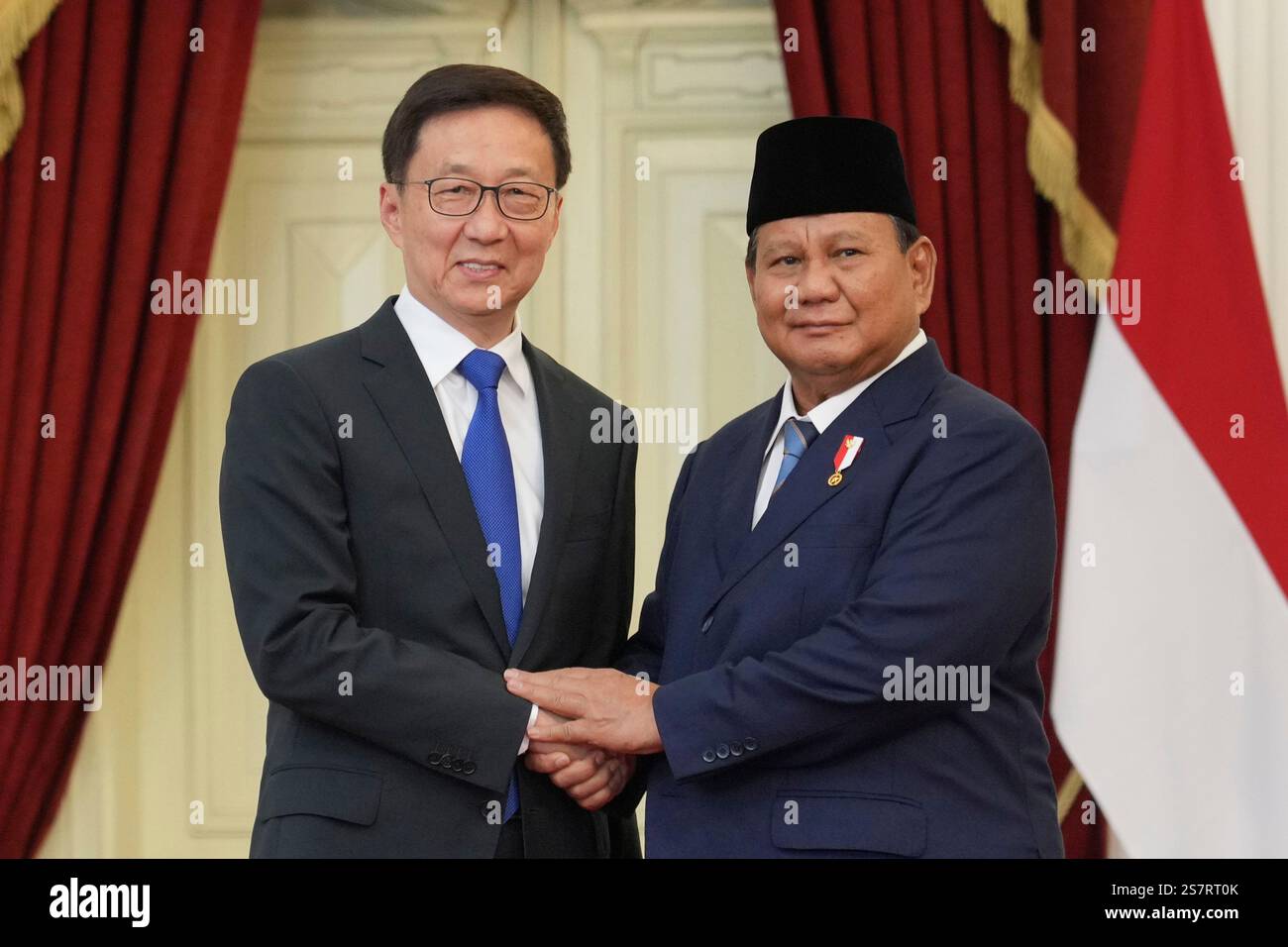 FILE - Indonesia's new President Prabowo Subianto, right, greets China ...