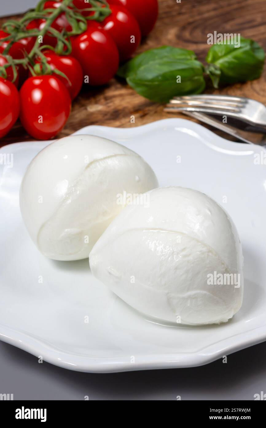 Tasty italian food, fresh white buffalo milk mozzarella soft cheese ...