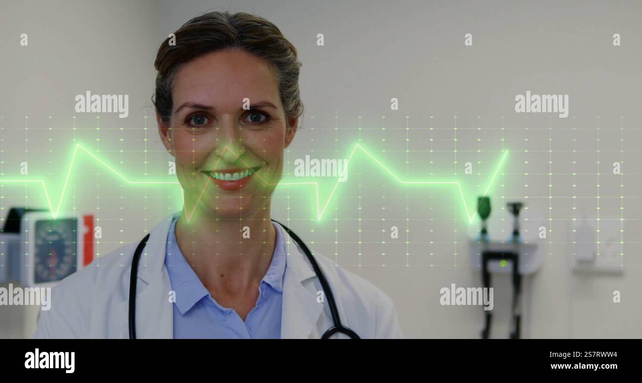 Image of cardiograph over caucasian female doctor smiling in hospital ...