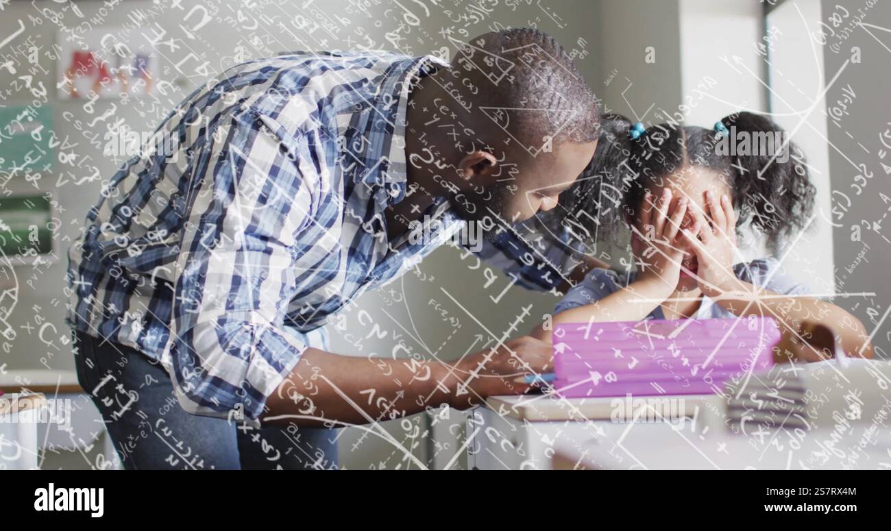 Image of mathematical equations over african american male teacher ...